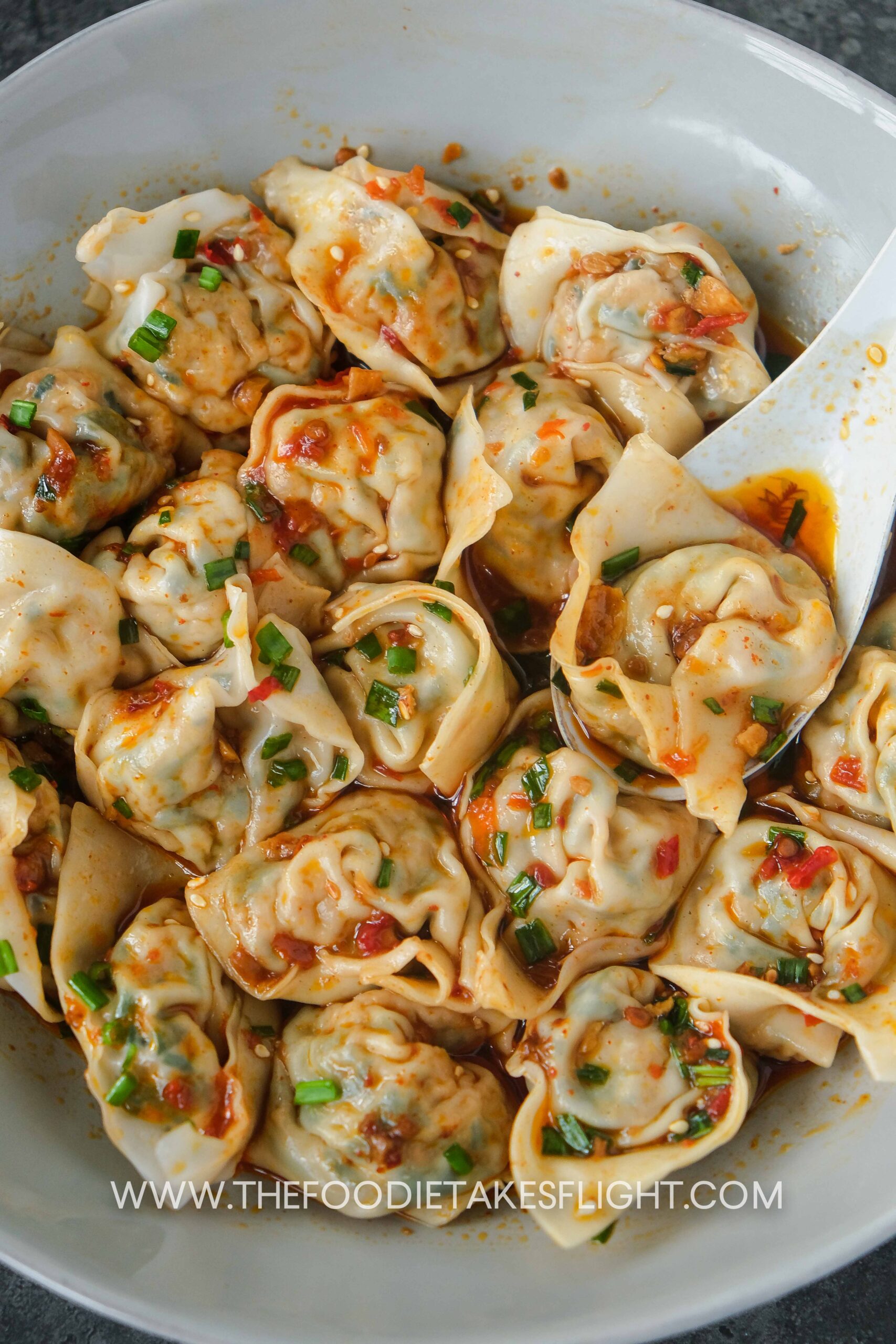 Tofu and Chive Wontons in Chili Broth - The Foodie Takes Flight