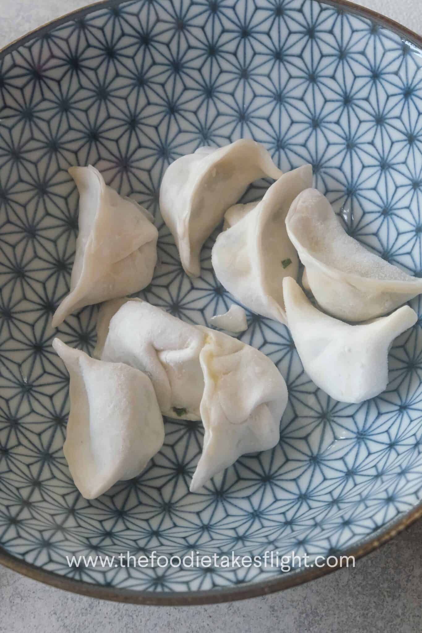 Hot and Sour Dumpling Noodle Soup - The Foodie Takes Flight