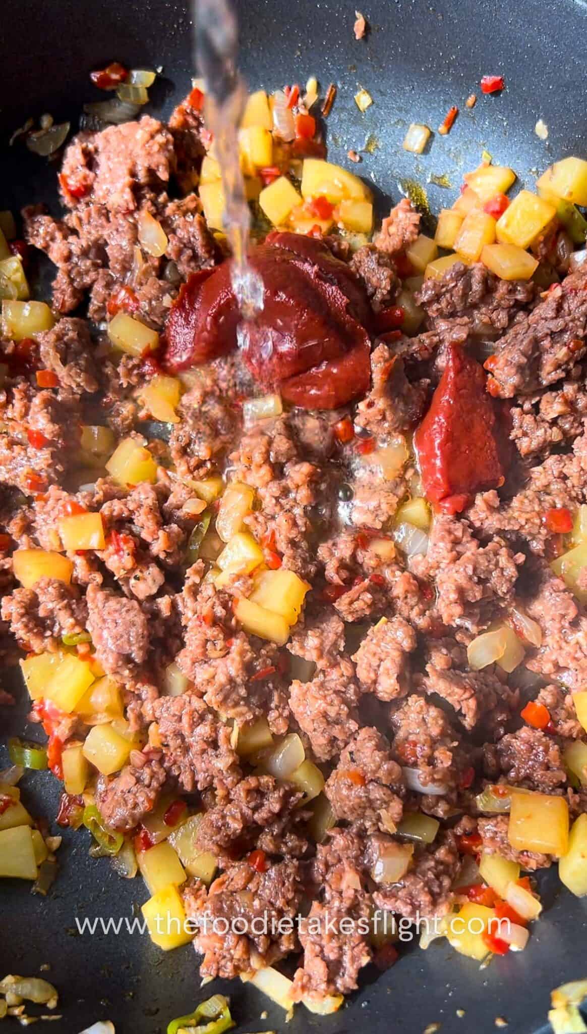 Filipino-Style Stuffed Bell Peppers - The Foodie Takes Flight