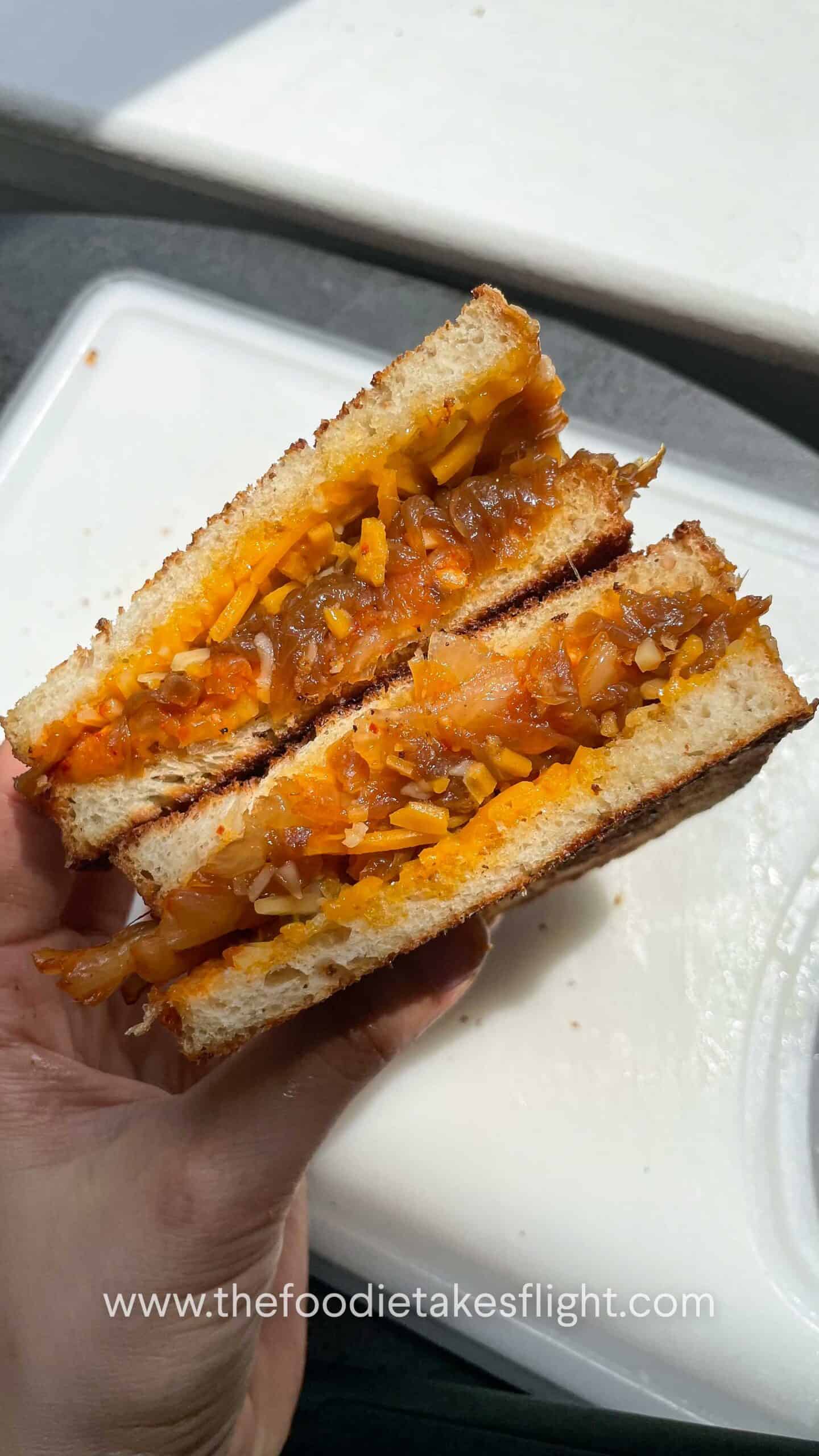 Caramelized Onion Kimchi Grilled Cheese Sandwich - The Foodie Takes Flight