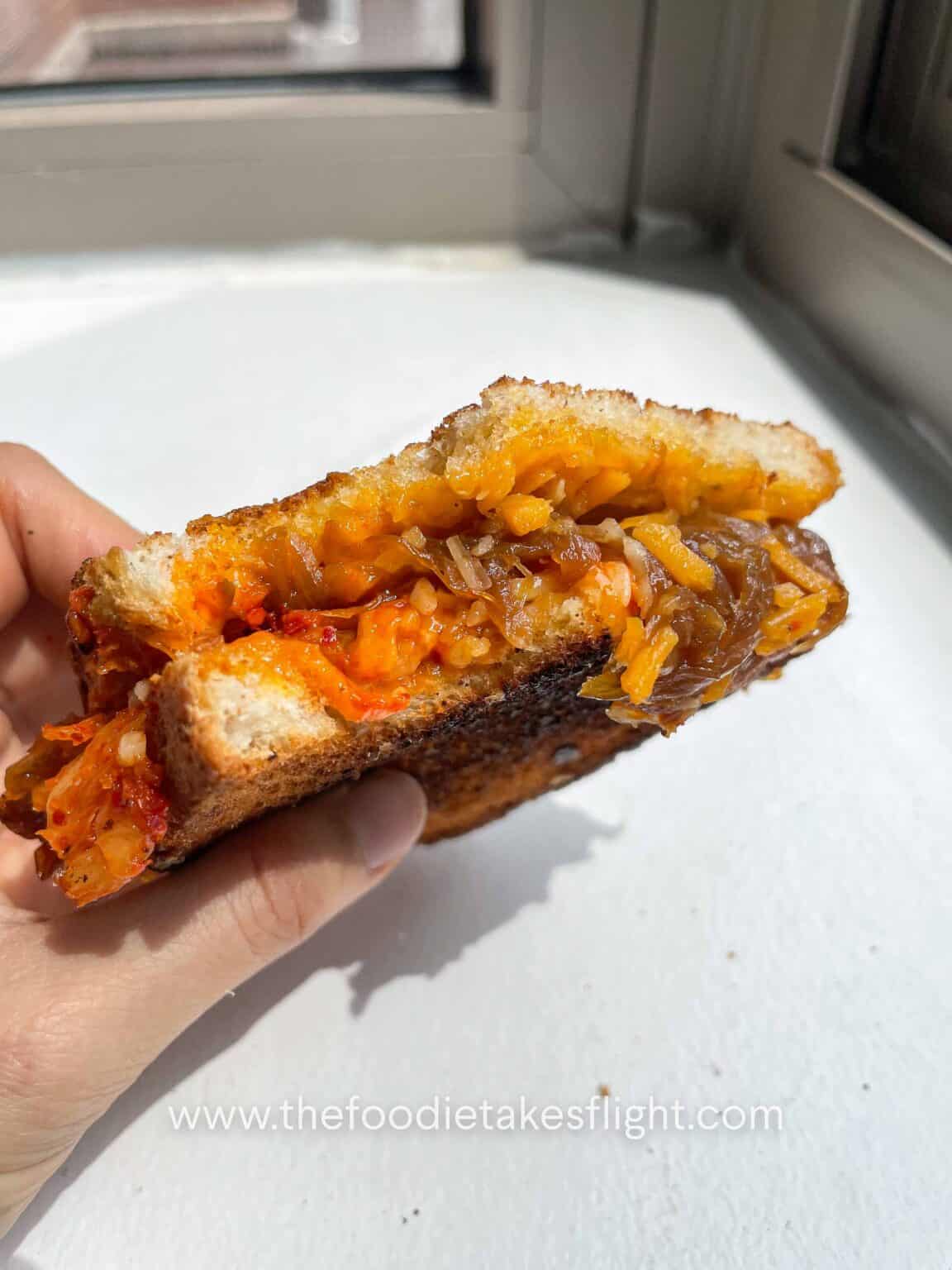 Caramelized Onion Kimchi Grilled Cheese Sandwich - The Foodie Takes Flight